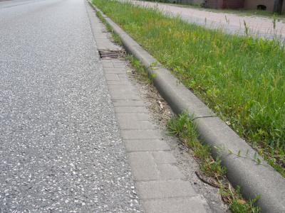 Reinigung der Rinnsteine an den Straßen - Kleeblattregion